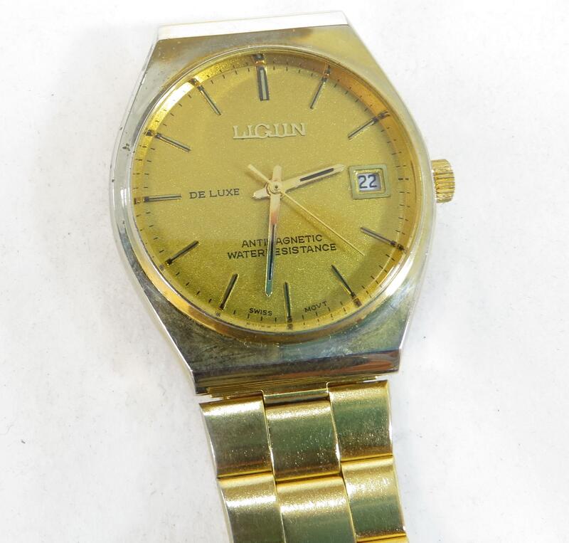 ੈ LIGUN 機械錶 手動上鏈 瑞士機械機芯 金色全鋼錶款 大三針 日期顯示 功能完全正常 走時準確 值得玩賞 | 露天市集 | 全台最大的 ...