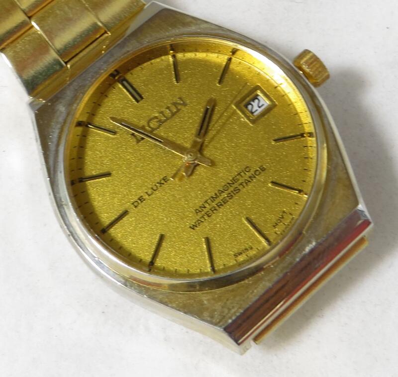 ੈ LIGUN 機械錶 手動上鏈 瑞士機械機芯 金色全鋼錶款 大三針 日期顯示 功能完全正常 走時準確 值得玩賞 | 露天市集 | 全台最大的 ...